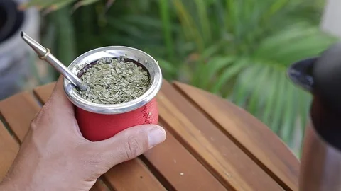 Man making yerba mate tea. Close up pour... | Stock Video | Pond5