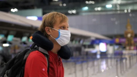 Man in medical Face Mask with backpack w... | Stock Video | Pond5