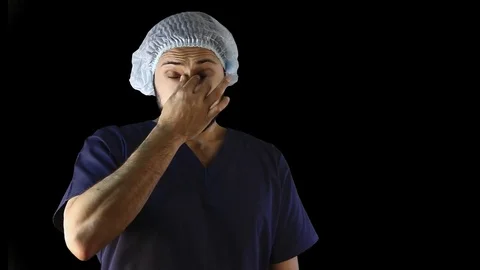 A man with a mustache in a medical unifo... | Stock Video | Pond5