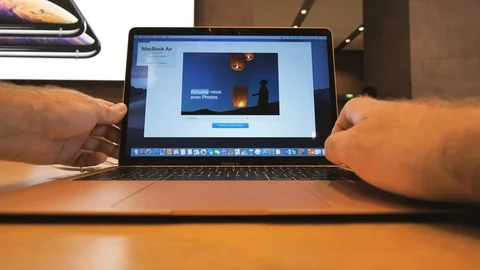 Man open laptop Apple MacBook Air lid | Stock Video | Pond5