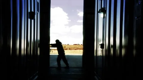 Man opening the Gate of a Large Warehous... | Stock Video | Pond5