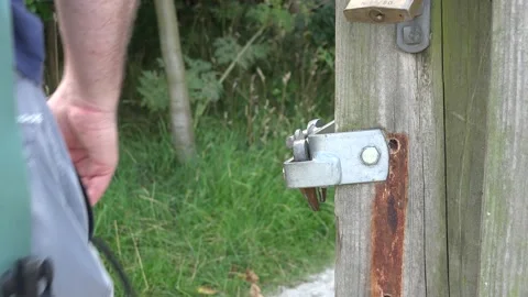 Man Opening Gate Stock Video Footage | Royalty Free Man Opening Gate ...