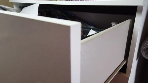 Man opens a drawer in the Cabinet | Stock Video | Pond5