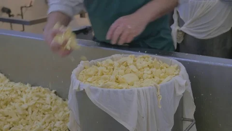 Man packing cheese in barrel to make a c... | Stock Video | Pond5