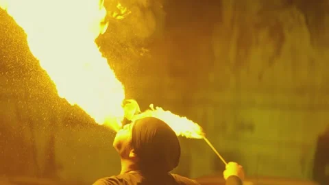 Man performing fire show, spraying ker... | Stock Video | Pond5