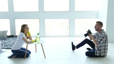 Man photographer explain poses to woman... | Stock Video | Pond5