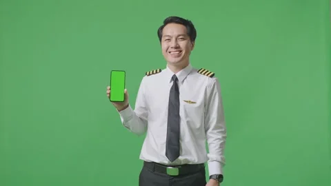 Man Pilot Smiling And Showing Green Scre... | Stock Video | Pond5