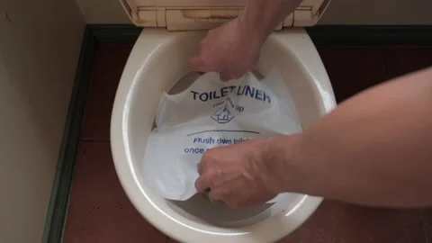 Man Places Faeces Collection Liner In To... | Stock Video | Pond5