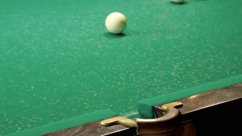 Man playing billiards, hitting balls wit... | Stock Video | Pond5