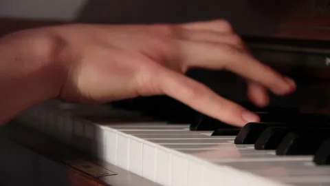 A Man Playing a German Upright Piano. Cl... | Stock Video | Pond5