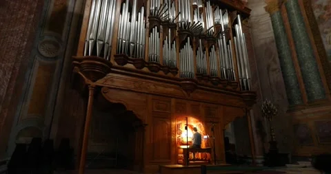 A man plays a church organ, an organ in ... | Stock Video | Pond5