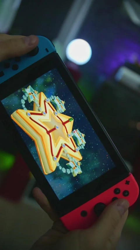 Man plays Super Mario on Nintendo Switch... | Stock Video | Pond5