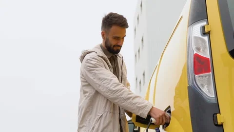 Man Electric Car Stock Videos – Royalty-Free HD & 4K Videos | Pond5