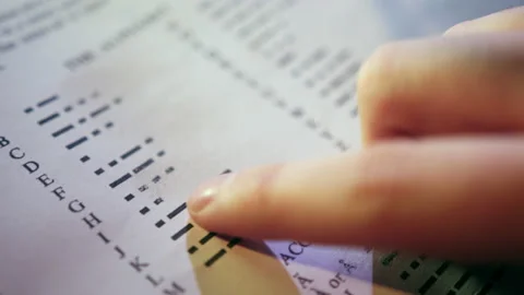 Man points finger on Morse code alphabet... | Stock Video | Pond5
