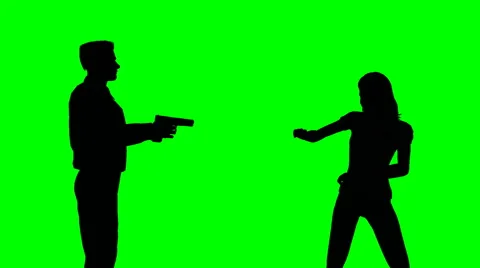 Man points a gun at a woman green screen | Stock Video | Pond5