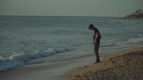 Man pulling up his pants after peeing on... | Stock Video | Pond5