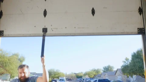 Man Pulling a Roll-up Sliding Rear Door ... | Stock Video | Pond5