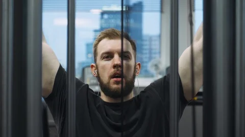 Man pulls and lifting blocks on rack mac... | Stock Video | Pond5