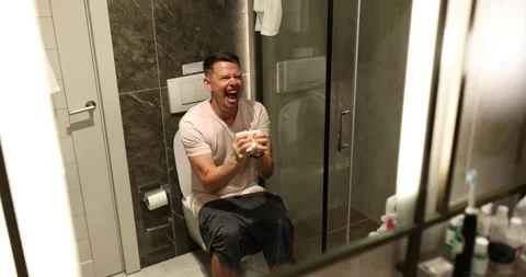 Man Pooping Stock Video Footage | Royalty Free Man Pooping Videos | Pond5