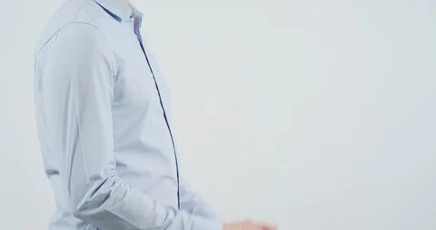 Man putting hands together and praying | Stock Video | Pond5