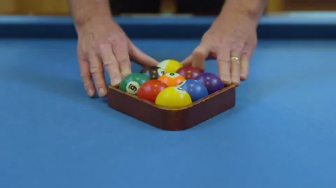 Man Racking Pool Balls in Nine-Ball Form... | Stock Video | Pond5