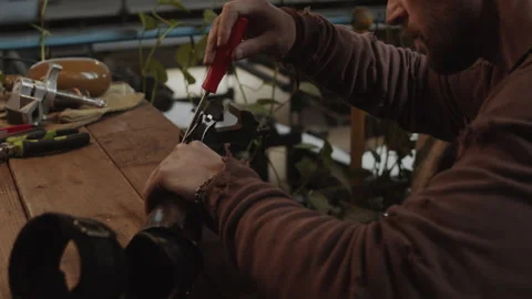 Man Repairing Prosthesis Arm with Screwd... | Stock Video | Pond5