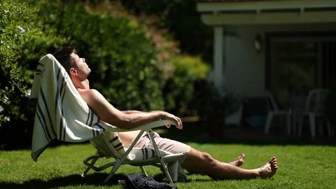 Sunbathing Stock Video Footage | Royalty Free Sunbathing Videos | Pond5
