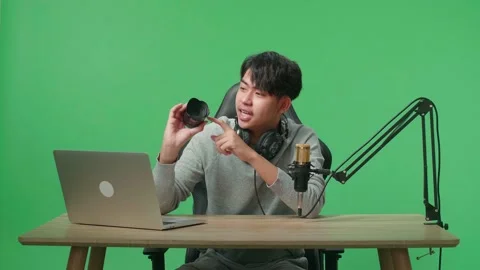 Man Reviewing Camera Len While Sitting I... | Stock Video | Pond5