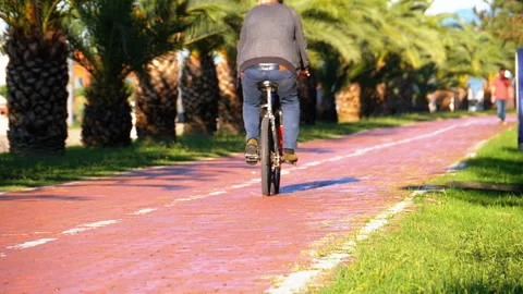 Man Riding an Three-wheeled Electric Sco... | Stock Video | Pond5
