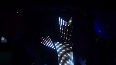 Man in robot costume dancing at the part... | Stock Video | Pond5