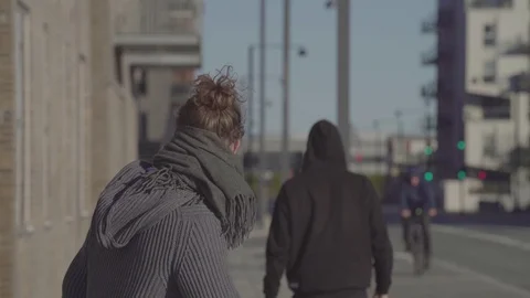 Man running after another person on the ... | Stock Video | Pond5