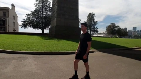 Man running along pathway in park undern... | Stock Video | Pond5