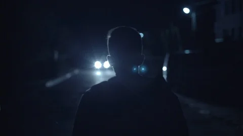 Man running with the car light in the da... | Stock Video | Pond5