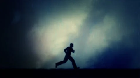Man Running Fast Under a Lightning Storm... | Stock Video | Pond5
