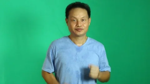 Man running with green background | Stock Video | Pond5