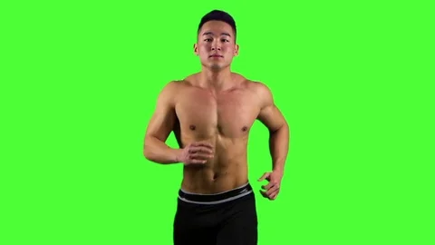 Man running on a green screen background... | Stock Video | Pond5
