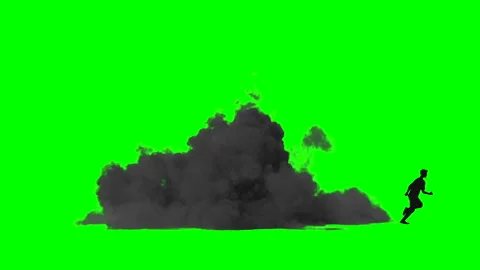 Man running from a ground explosion gree... | Stock Video | Pond5