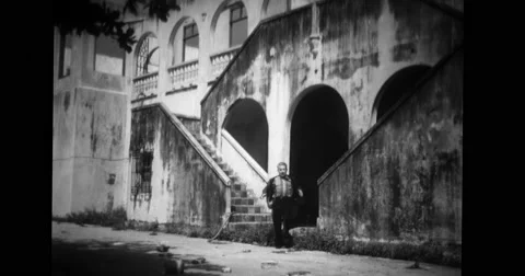 Man running out of a building | Stock Video | Pond5