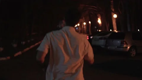 Man running through city at night. Media... | Stock Video | Pond5