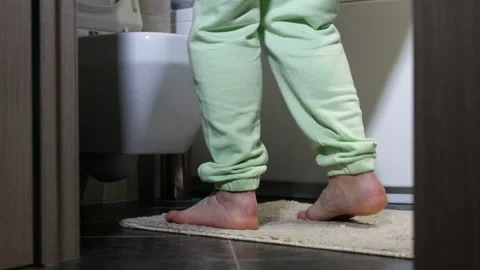 Man running to the toilet has diarrhea. ... | Stock Video | Pond5