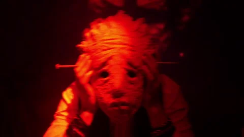 A man in a scary mask of an evil creatur... | Stock Video | Pond5