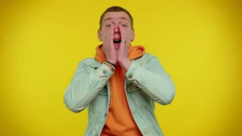 Man scream with hand near mouth waving a... | Stock Video | Pond5