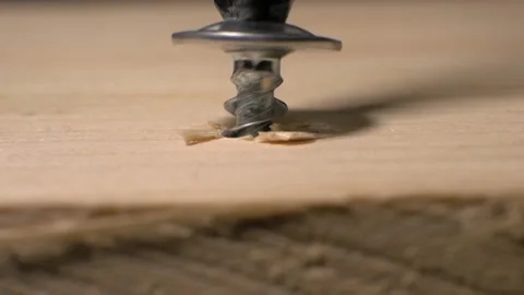 Man screwing a self-tapping screw into a... | Stock Video | Pond5