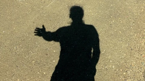 Man Shadow on Wall Expressions | Stock Video | Pond5