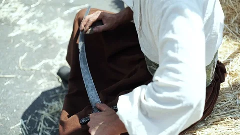 Sharpening Sword Stock Video Footage | Royalty Free Sharpening Sword ...