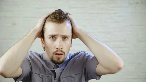 Man shocked looking in the camera 4K | Stock Video | Pond5