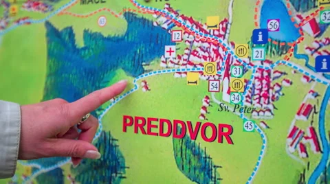 A man showing a route on a map | Stock Video | Pond5