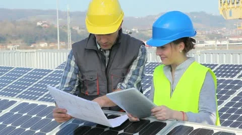 man showing solar panels technology to s... | Stock Video | Pond5