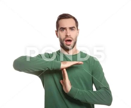 Man showing TIME OUT gesture in sign language on white background Stock ...