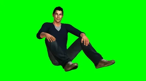 Man sits down green screen | Stock Video | Pond5
